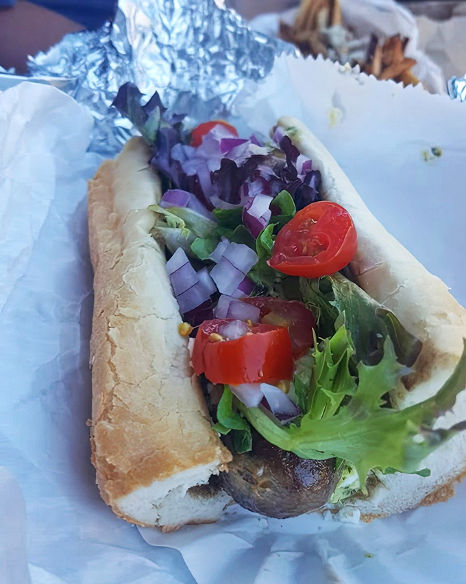 This veggie dog proves plant-based can be just as photogenic—fresh toppings adding vibrant color and crunch to a meat-free masterpiece.