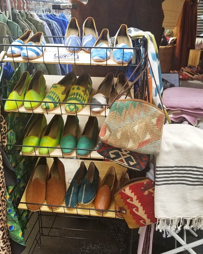 Vintage footwear arranged like a colorful timeline of fashion history. Those lime green loafers are either hideous or genius—possibly both.