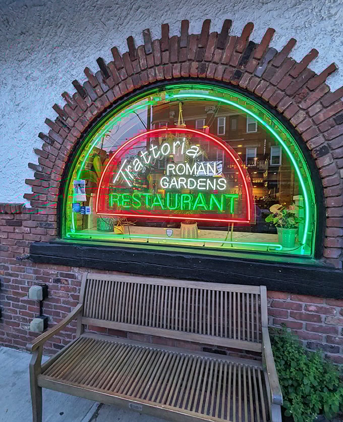 The neon sign glows like a beacon in the night, guiding hungry souls to their pasta salvation on Cleveland's Little Italy strip.