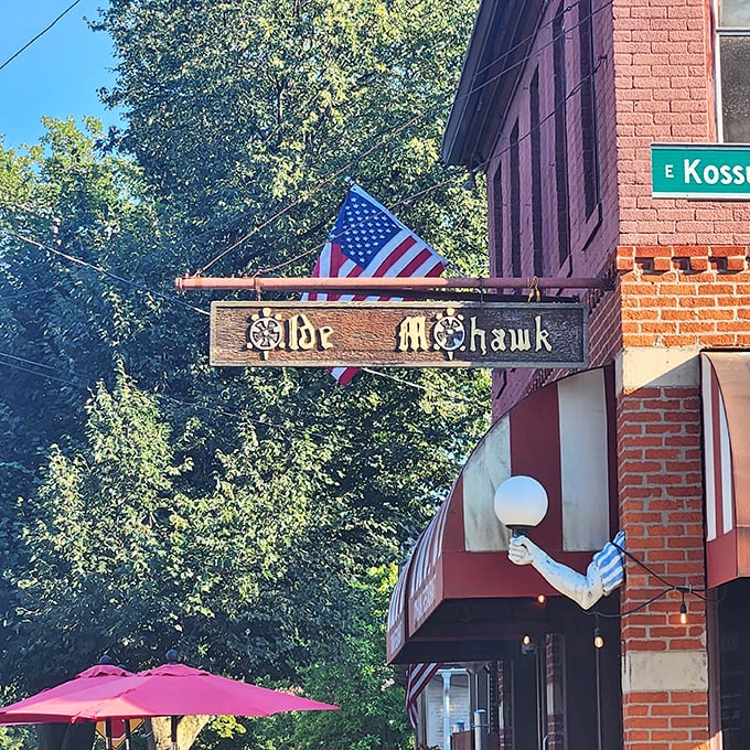 The Old Mohawk's vintage sign and American flag announce this corner spot as a proud neighborhood fixture on East Kossuth Street.