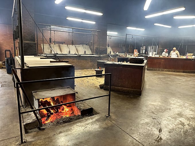 The pit room—where fire, smoke, and time perform their ancient alchemy, transforming tough cuts into tender treasures.