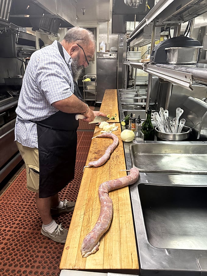 In this kitchen, sausage-making isn't kept secret—it's elevated to an art form with the precision only decades of experience can bring.