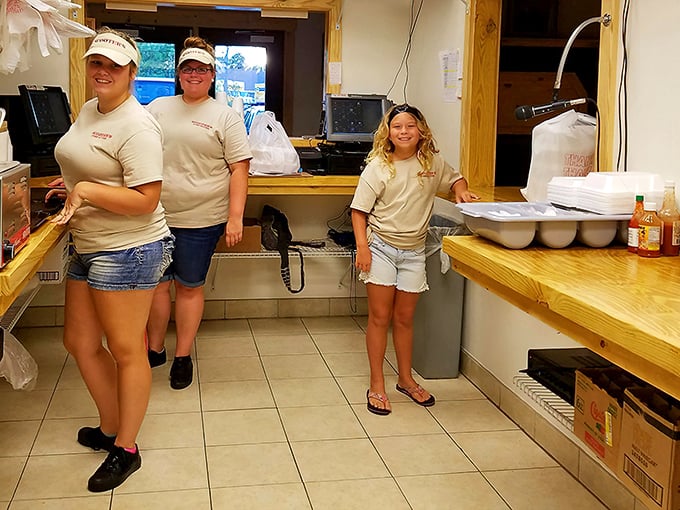 The friendly staff – seafood's unsung heroes who transform Gulf treasures into the golden-fried masterpieces that keep us coming back.