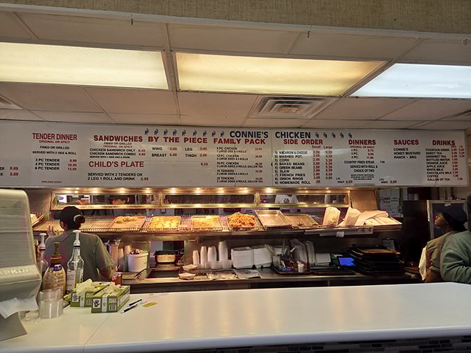Where chicken dreams come true—a glimpse behind the counter reveals the workspace where Tupelo's favorite comfort food comes to life.
