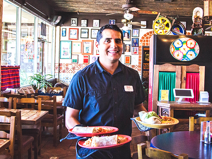 The pride on display here isn't just about carrying plates – it's about delivering family recipes that have stood the test of time.