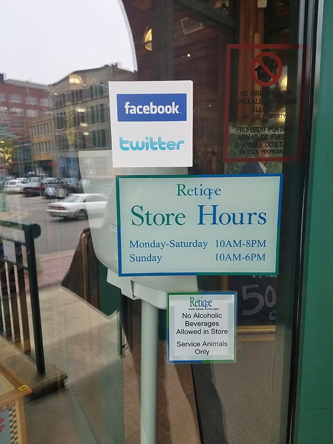 Store hours posted clearly—because knowing when to hunt is half the battle in the competitive sport of thrifting.