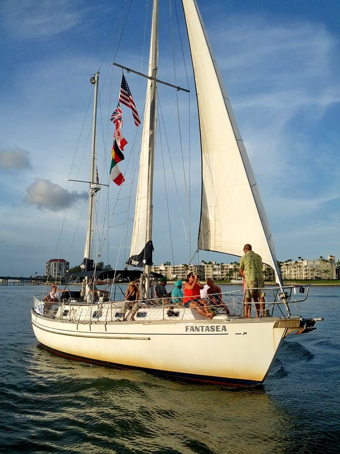 Setting sail at sunset—this vessel named "Fantasea" delivers exactly what its name promises along the Gulf Coast.