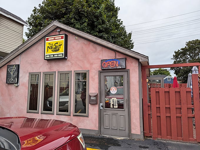 The Nest's pink exterior and red fence make this unassuming eatery impossible to miss—and trust me, you wouldn't want to miss what's cooking inside.