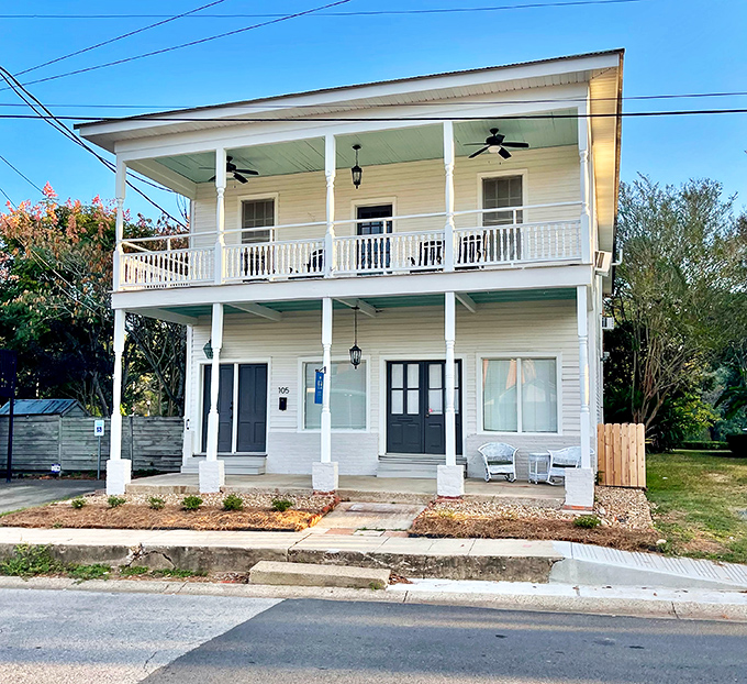 This classic Southern home with double galleries whispers stories of rocking chair afternoons and evening cocktails that stretched past sunset.