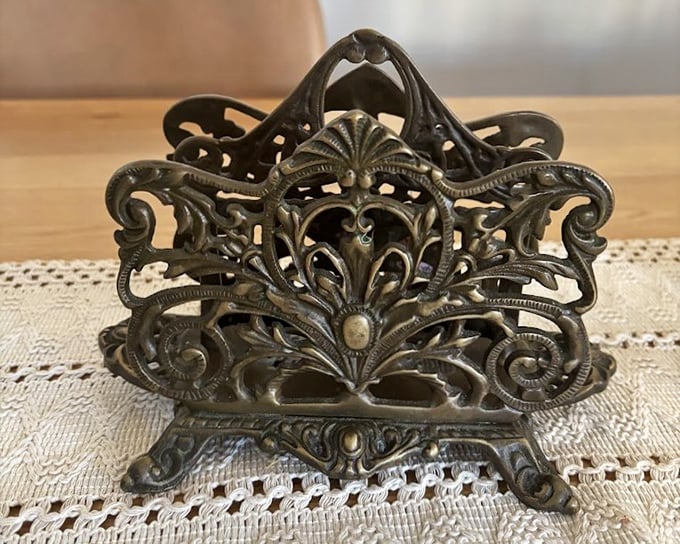 Not just a tissue holder—a miniature metal masterpiece of Victorian excess. Even your sneezes deserved ornate presentation back then!