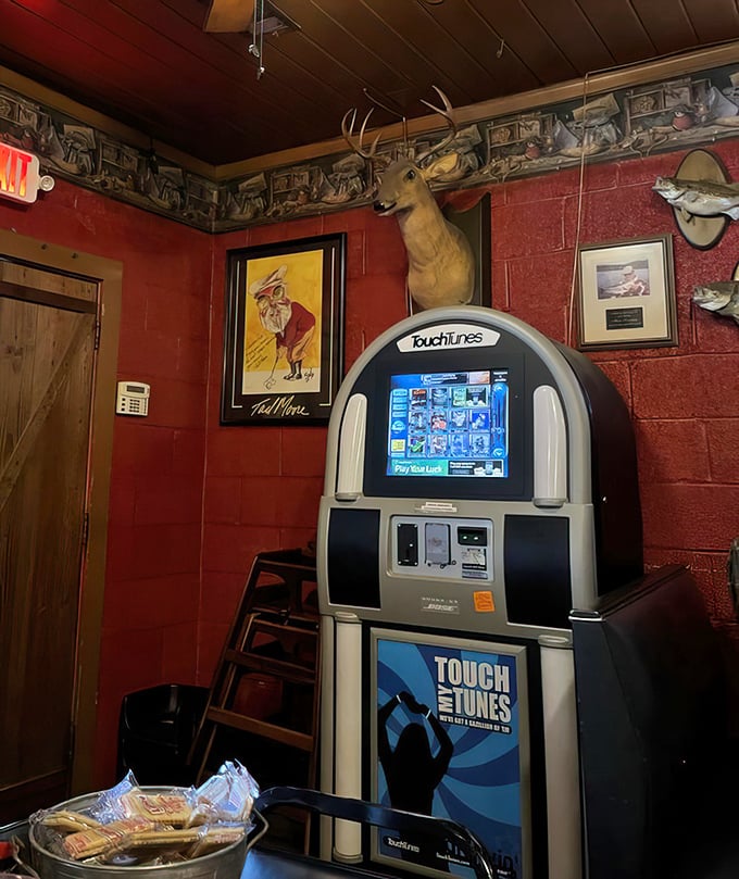 Even the entertainment corner features a mounted deer head—because at Hunters, the theme isn't just a name, it's a lifestyle.