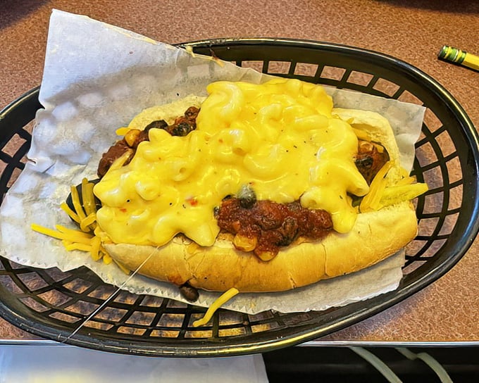 Mac and cheese meets hot dog in a comfort food summit. Like reuniting with two old friends who turn out to be perfect for each other.