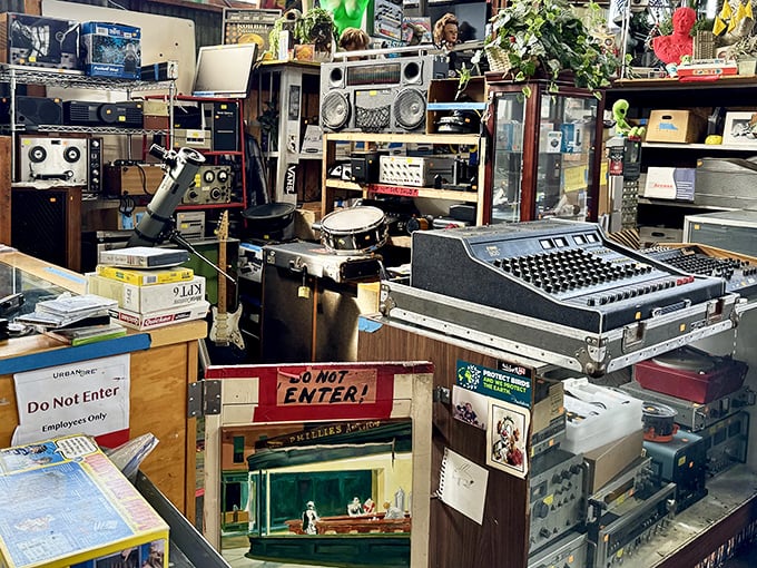 A control panel from a recording studio sits among vintage electronics—someone's musical history waiting for its encore performance.