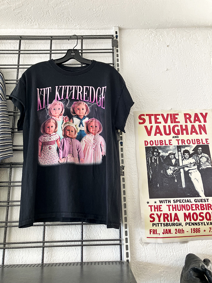 Vintage concert posters meet quirky graphic tees. That Kit Kittredge shirt is both terrifying and terrific—the hallmark of thrift store gold.