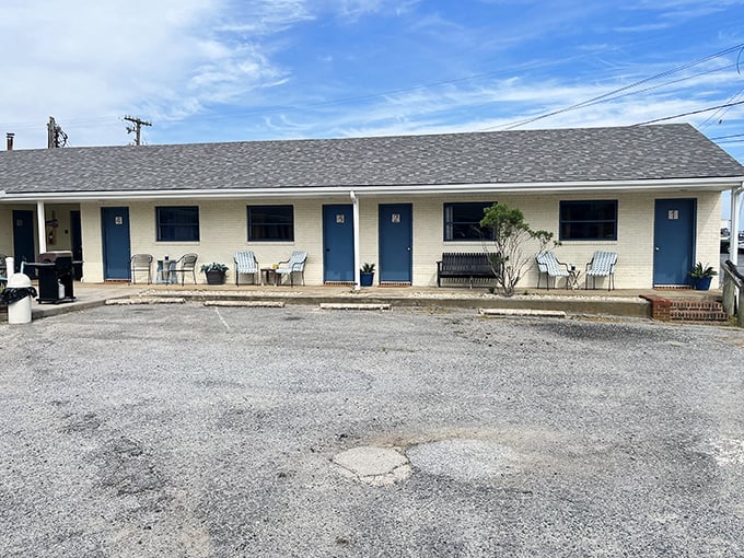 Simple accommodations with front-porch philosophy included. These motel rooms offer something five-star hotels can't – authentic coastal character without pretension.