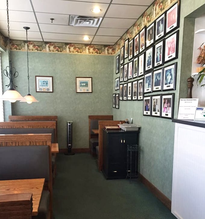 A wall of memories and moments shared over countless meals, proving this restaurant is more community living room than mere eatery.