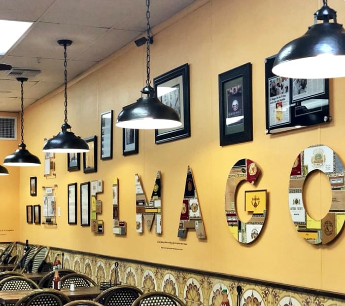 Those letters spell "MAGO" but they might as well spell "MAGIC"—the wall of fame showcasing years of culinary wizardry.