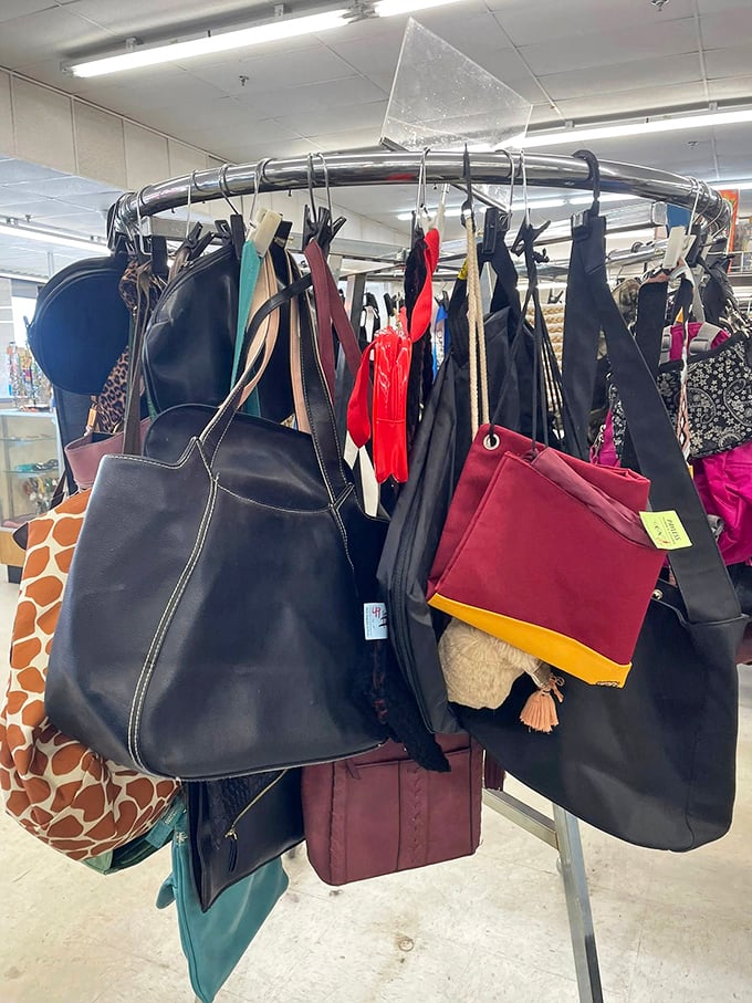 Handbag heaven on a circular rack—designer dreams and practical carryalls waiting for their next shoulder to ride.