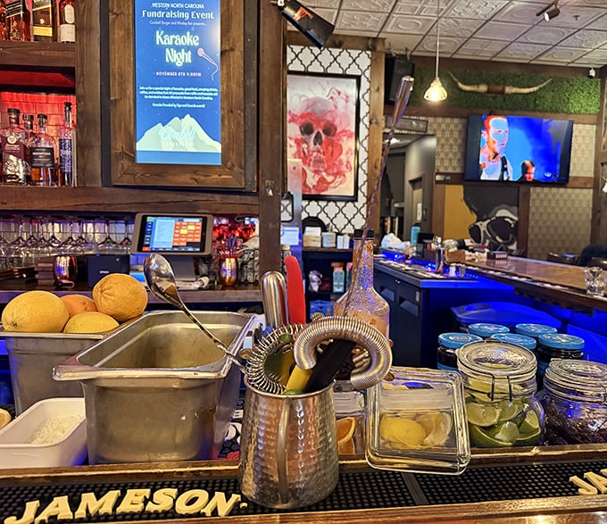 Fresh citrus and cocktail tools standing at attention—the mise en place of mixology magic about to happen at Cowbell's bar.