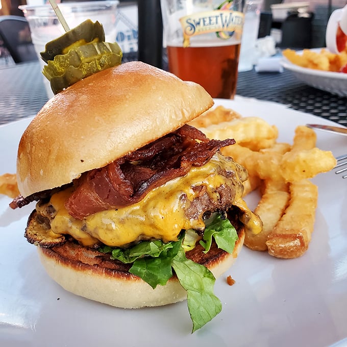 This isn't just a burger – it's a masterpiece of beef, bacon, and melted cheese that requires both hands and a strategy. The crinkle-cut fries are non-negotiable.