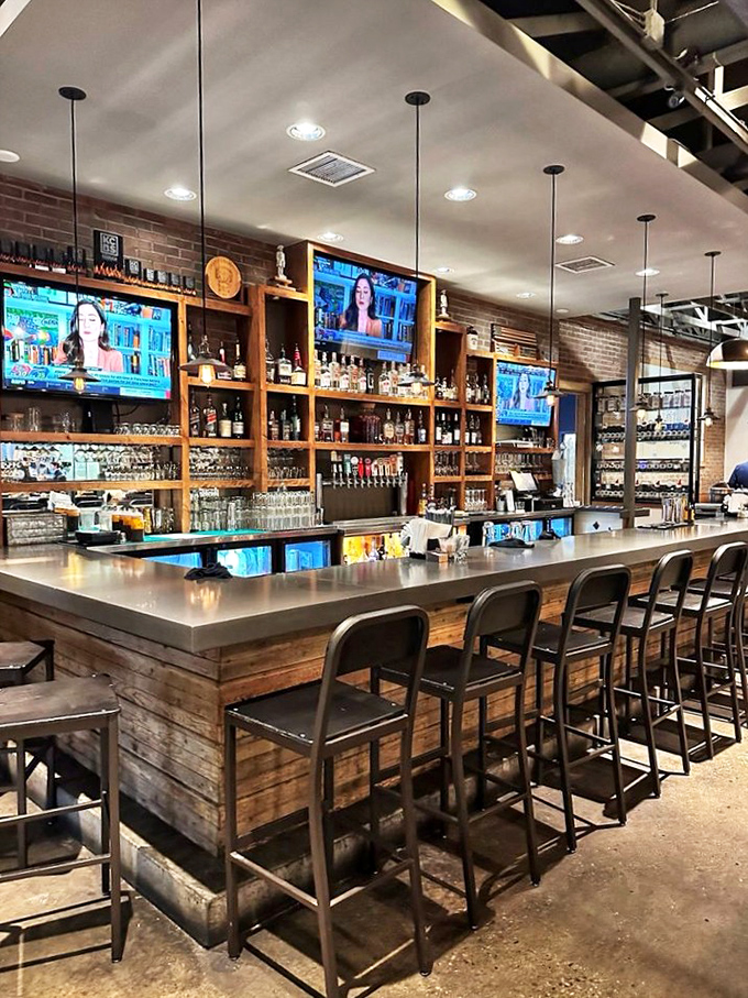 The bar at Q39 isn't just a waiting area – it's a front-row seat to bourbon artistry and craft beer selection that complements smoky flavors.
