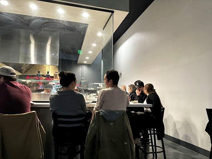 Counter seating: where pizza voyeurs get the best view in the house. Sometimes watching is half the pleasure.