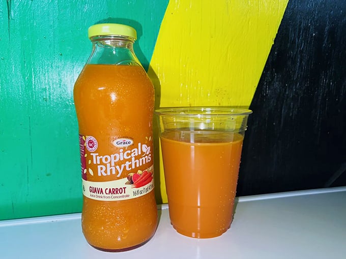 That vibrant orange tropical drink isn't just refreshing—it's like liquid sunshine that washes away the mundane with every sip.