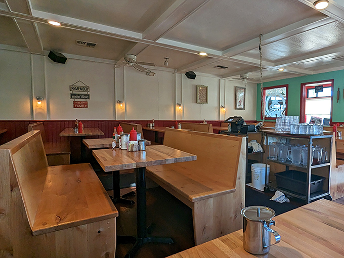 Wooden booths worn smooth by decades of elbows and conversations—the kind of authentic patina no designer could fake if they tried for a hundred years.
