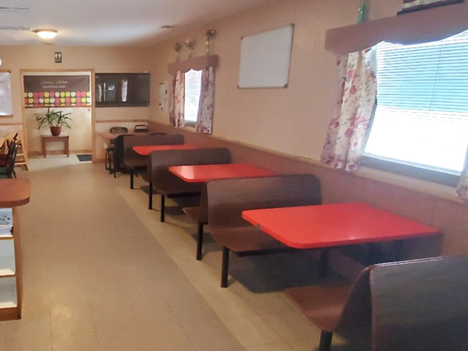 The red-topped booths aren't trying to be Instagram-worthy—they're designed for comfort during long conversations and second helpings.