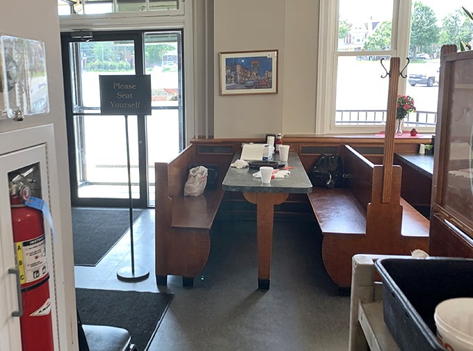 That "Please Seat Yourself" sign isn't just an instruction—it's an invitation to become part of the Ritz Barbecue family.