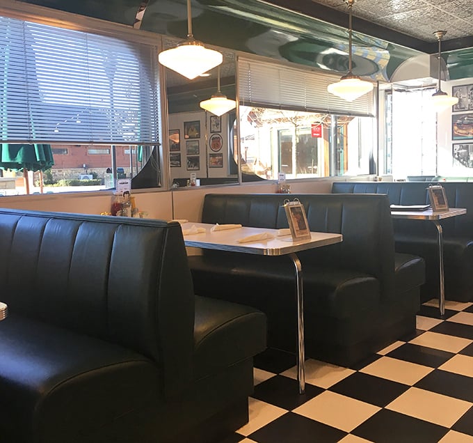 Classic booth seating invites you to slide in and stay awhile – these vinyl-covered time machines have cradled generations of satisfied diners.