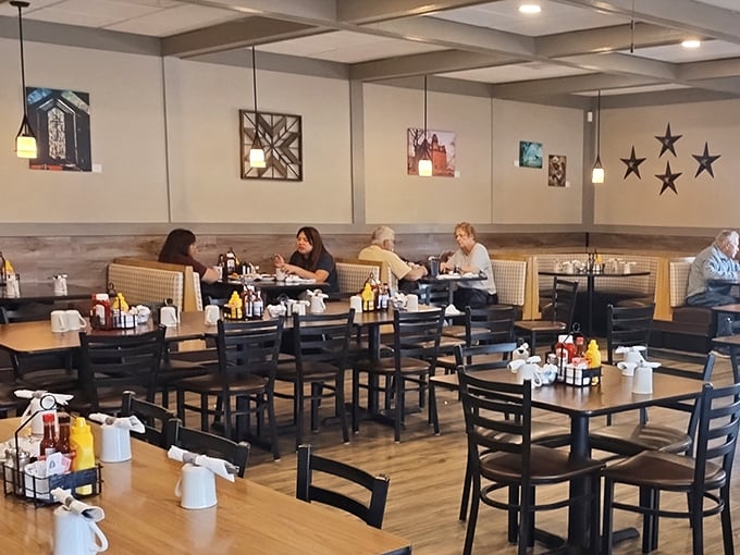 Booths designed for lingering conversations and extra bites of pie. The stars on the wall aren't for decoration—they're earned.