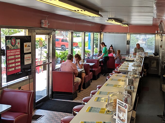 Red vinyl booths – the unofficial thrones of diner royalty – await customers ready to slide in and tackle a menu of comfort food classics.