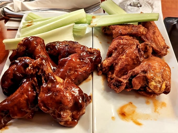 These wings aren't just sauced—they're baptized in flavor, offering both tangy buffalo and savory dry-rub options. Celery sticks stand by for cooling relief.