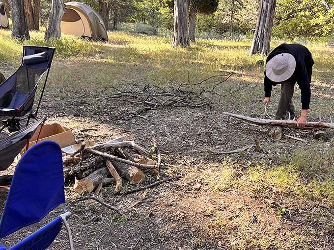 Gathering firewood becomes a treasure hunt when camping in Ahjumawi – each stick a contribution to tonight's campfire stories.