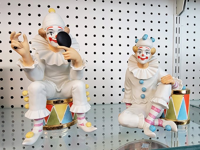 The clown figurines section: where childhood nightmares and quirky collections meet. Someone's treasured heirlooms await a new mantelpiece to haunt—I mean, grace.
