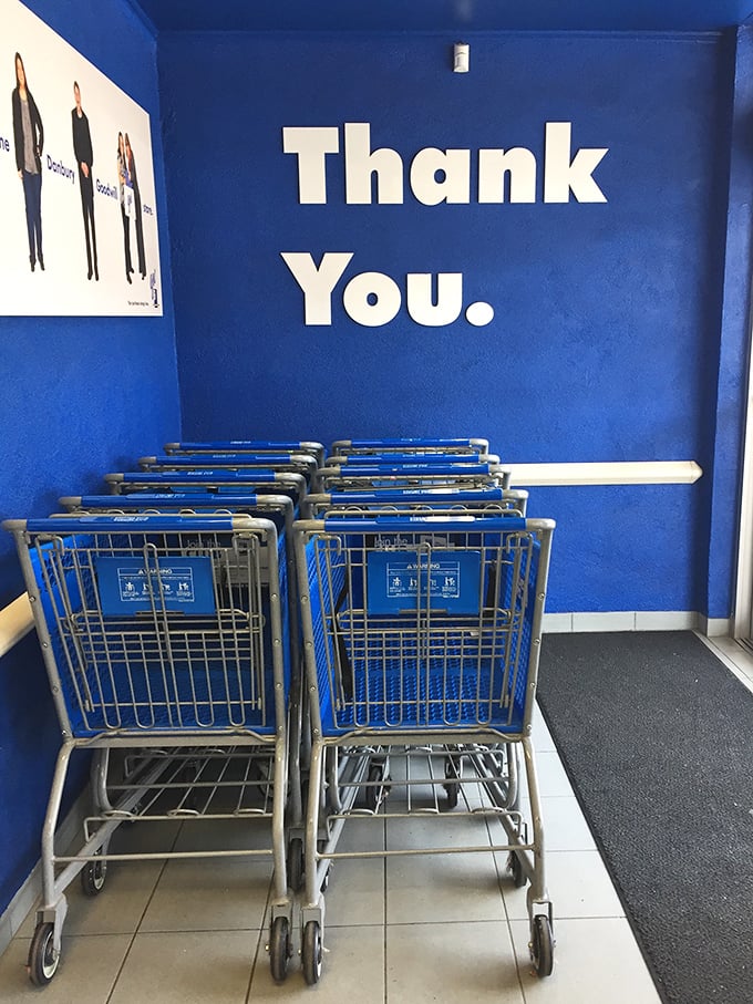 Shopping carts await beneath a grateful "Thank You" – a reminder that this retail experience supports a greater mission in the community.