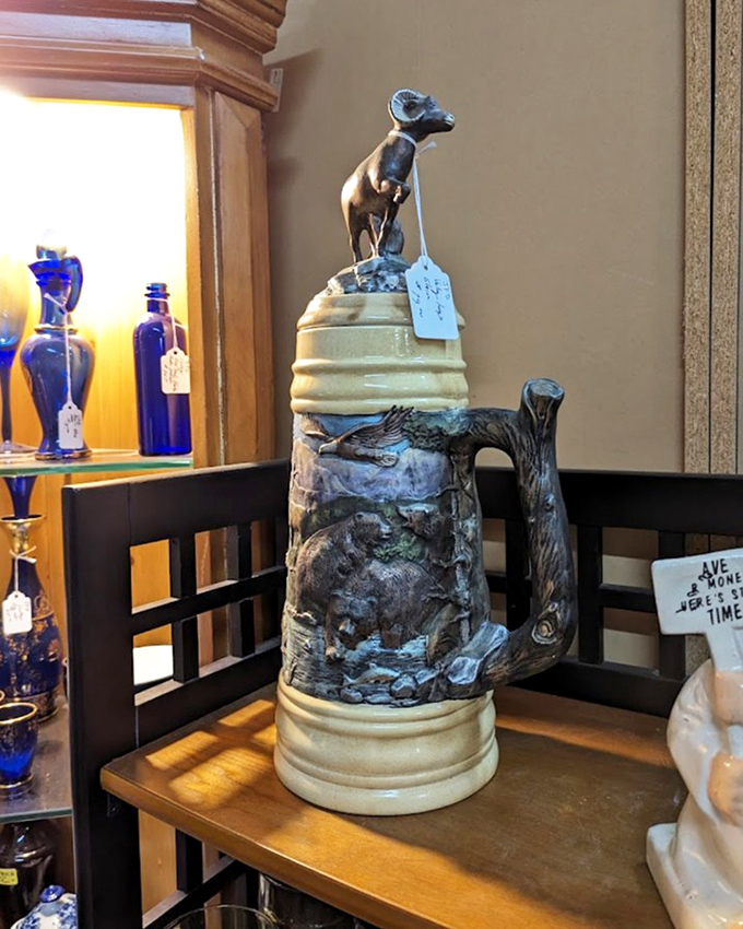 This elaborate beer stein featuring a mountain goat isn't just a container; it's a conversation starter with a handle and a history.