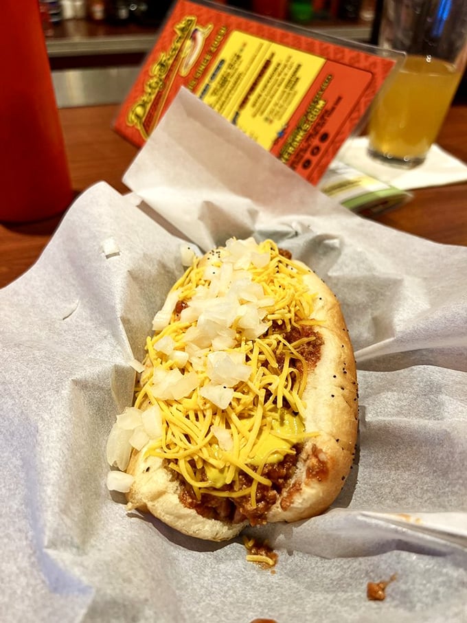 Chili, cheese, and onions in perfect harmony—a hot dog symphony where every bite hits the right note. Mozart wishes he created this.