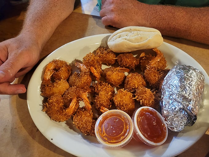 These coconut shrimp aren't just appetizers—they're little tropical vacations for your taste buds, complete with sweet dipping sauces for the journey.