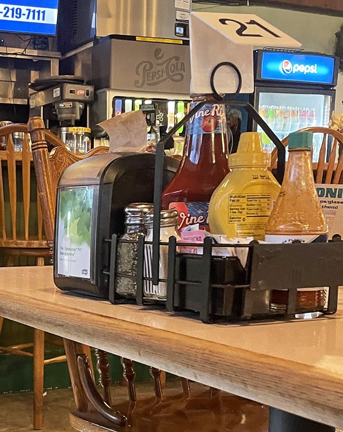The condiment caddy – that humble table centerpiece containing the magical potions that let you customize your meal to perfection.