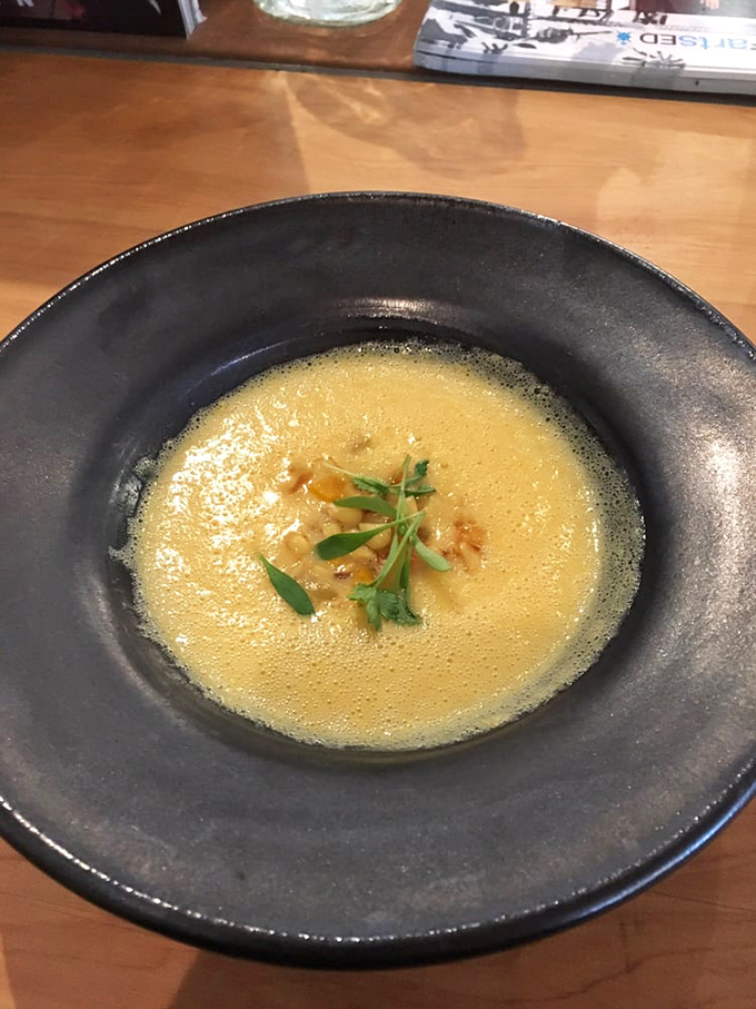 This corn chowder isn't just soup—it's liquid sunshine in a bowl, garnished with herbs and good intentions.