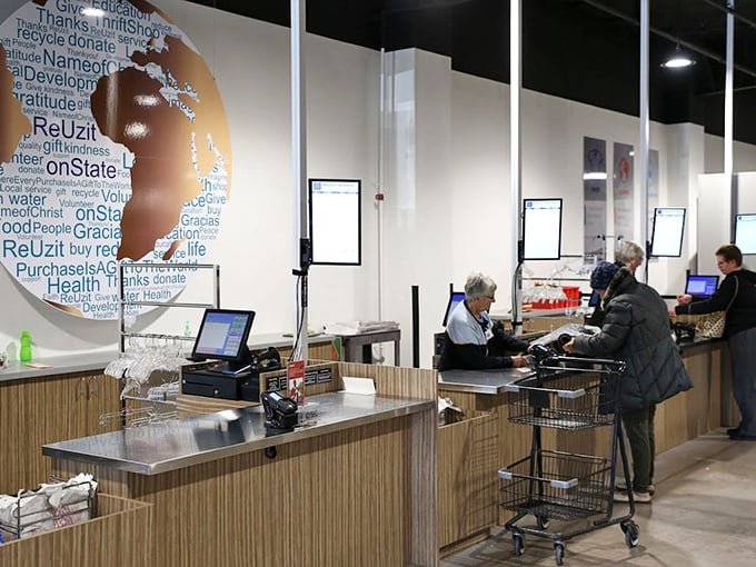 The checkout area where treasures and dollars part ways. That globe logo reminds shoppers their purchases support global relief efforts.