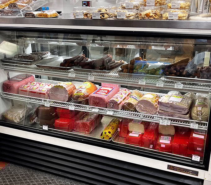 The deli case – where dreams are made and diets go to die. Each tray holds a different Polish specialty waiting to be discovered.