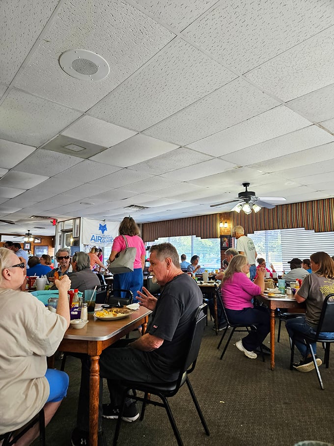 The ceiling may be ordinary, but what happens beneath it is extraordinary – a room full of people united by good food.