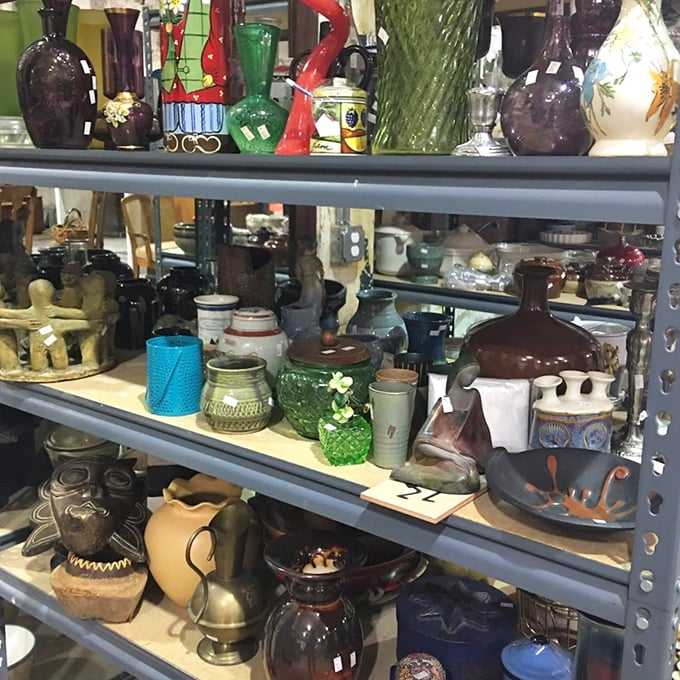 A colorful congregation of vases, pottery, and glassware—each piece wondering if it'll become someone's "I found this amazing thing" story.