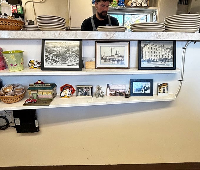 The shelf displays aren't curated for social media—they're authentic pieces of local history and personality that have earned their place over years.