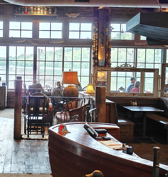 Those windows aren't just for views—they're cinema screens showing Lake Taneycomo's ever-changing moods while you feast on local specialties.