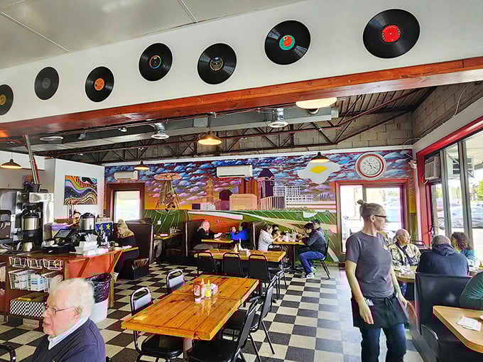 Vinyl records adorn the walls while diners enjoy their meals—proof that good food and good company never go out of style.