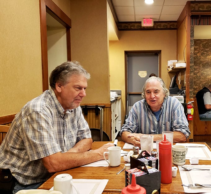 The regulars' table – where coffee flows freely and the world's problems are solved between bites of toast and eggs.